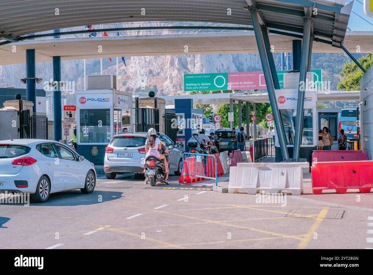 Vehicles and scooter passing through customs at Gibraltar international ...