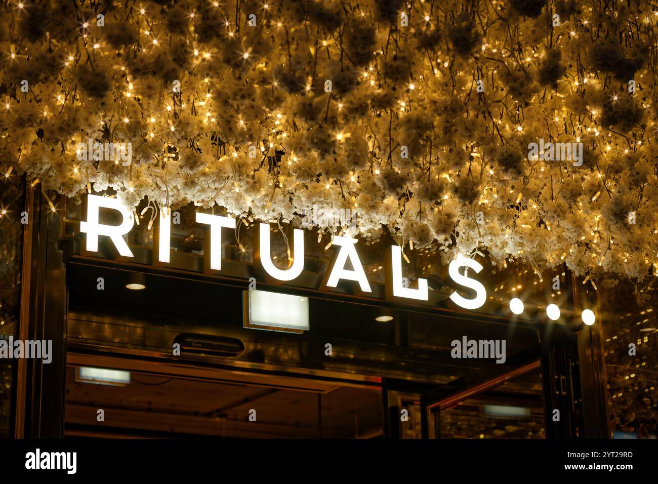 Cologne, Germany, December 04 2024: Illuminated advertising sign with ...