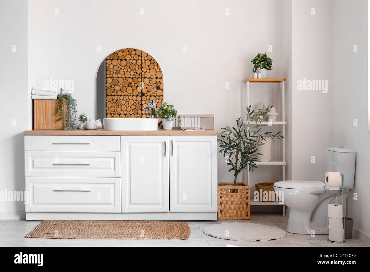 Stylish interior of modern restroom with modern toilet bowl, counter ...