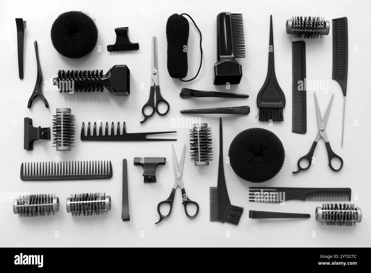 Different hairdresser's accessories on white background Stock Photo - Alamy