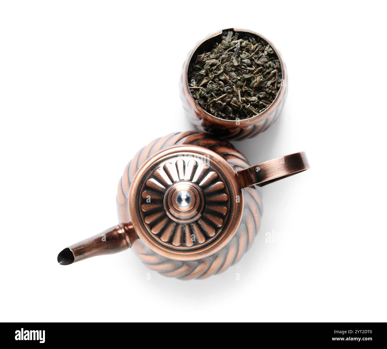 Beautiful vintage teapot, pot with tea leaves on white background. Top view Stock Photo - Alamy