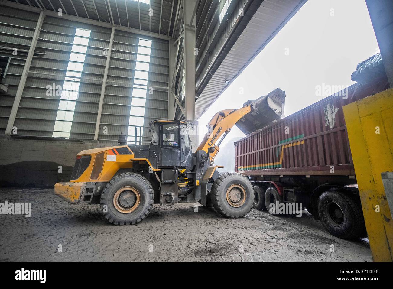 BIJIE, CHINA - NDECEMBER 4, 2024 - Workers load phosphate ore products ...