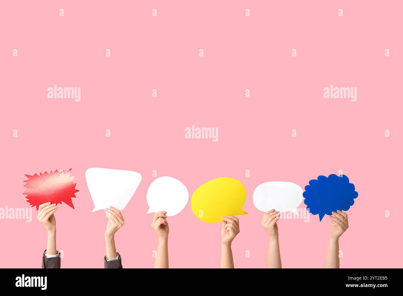 Women with blank speech bubbles on pink background. Gossip concept ...