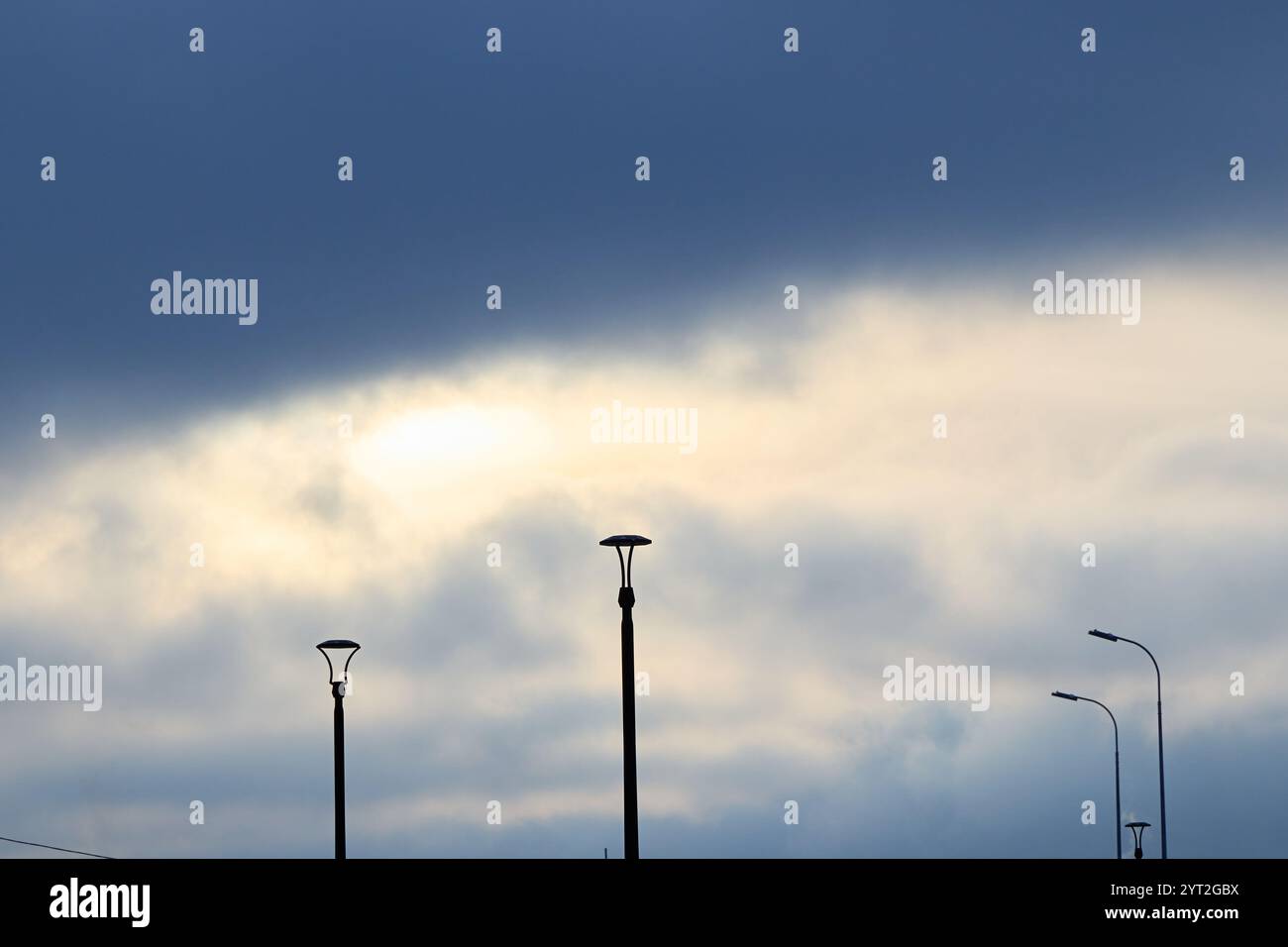 A Stunning Cloudy Sky With Street Lights Beautifully Depicted in ...