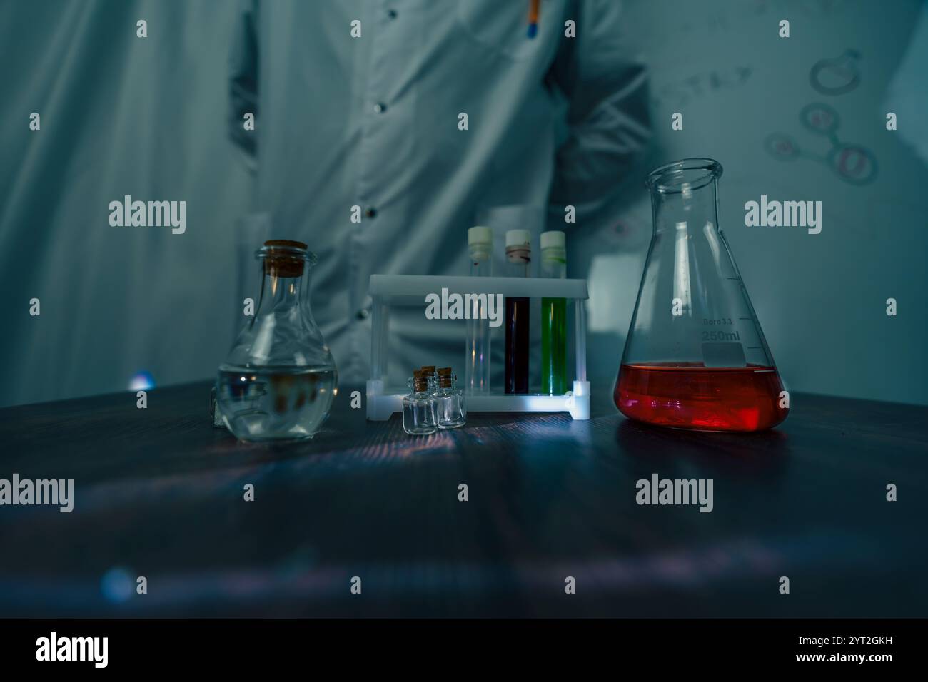 Scientist conducts vibrant chemical reaction hi-res stock photography ...