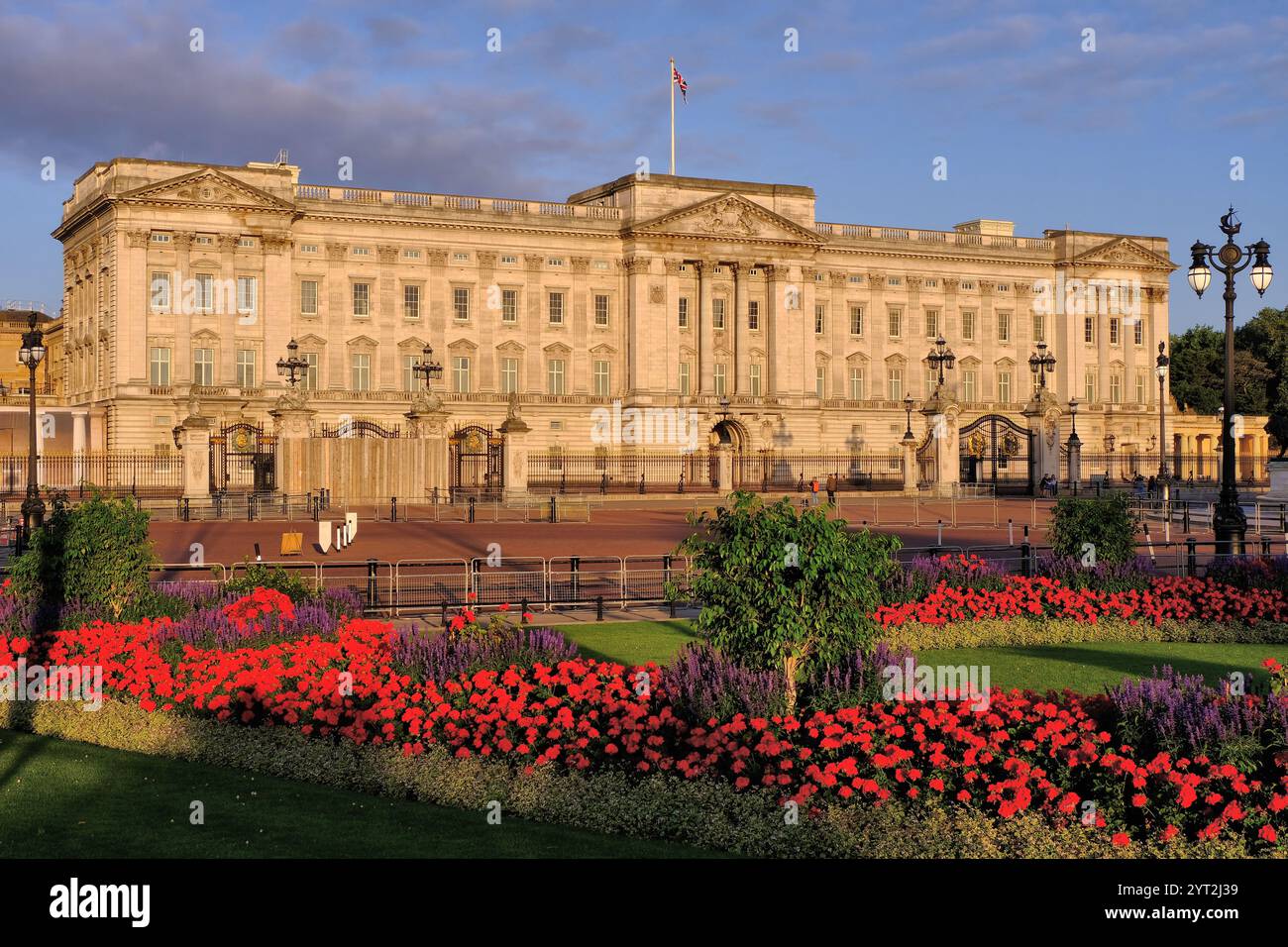 Buckingham Palace glowing orange soon after sunrise and vivid red ...