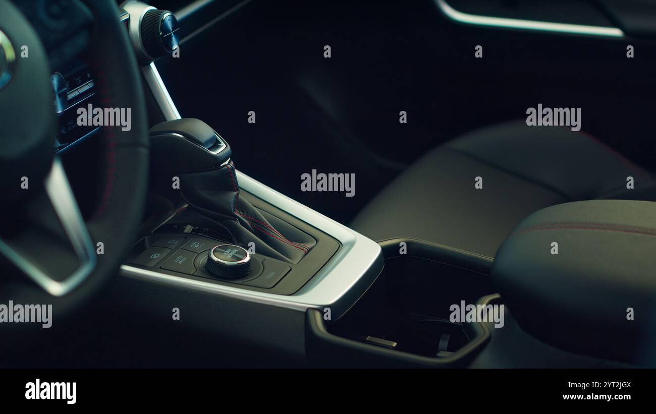 Close up shot of car interior console gear lever, wheel, beverage ...