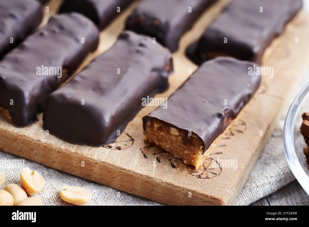 Homemade no-bake healthy bars made of whey protein powder, dates and ...