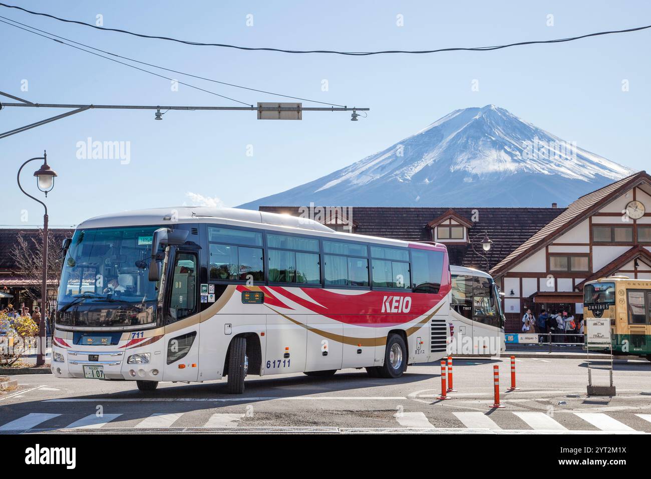 Kawaguchiko Station and Bus Terminal in Yamanashi Prefecture, Japan with snow-capped Mt. Fuji in ...
