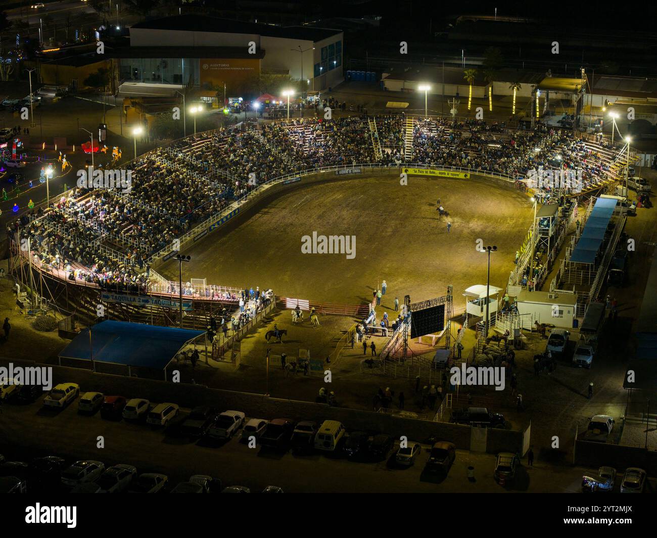 Cars in parking lot and rodel arena at the Sonora State Rodeo Arena at ...
