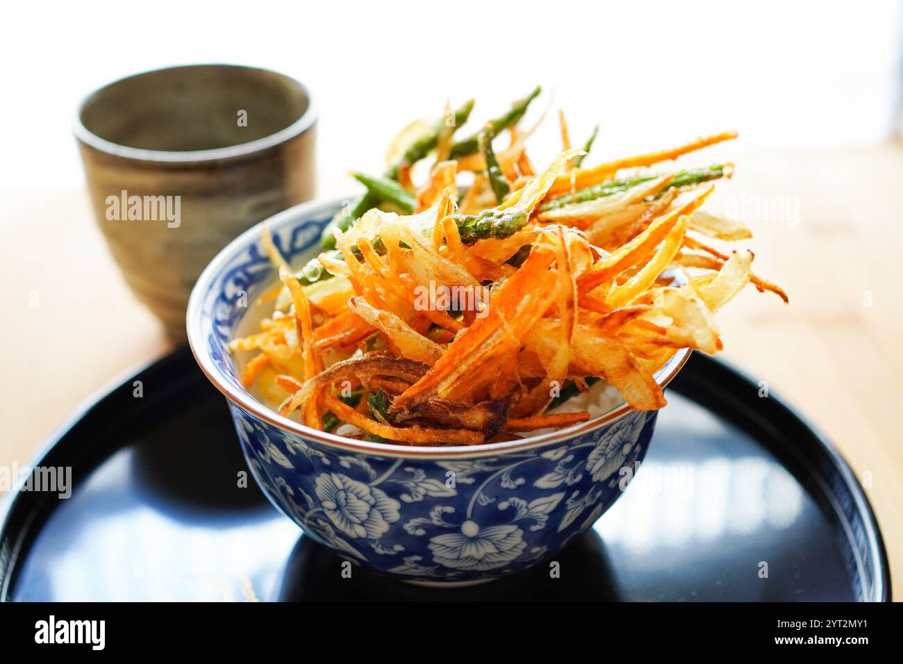 Kakiage tempura donburi, or crispy mixed vegetable tempura, is a hearty ...