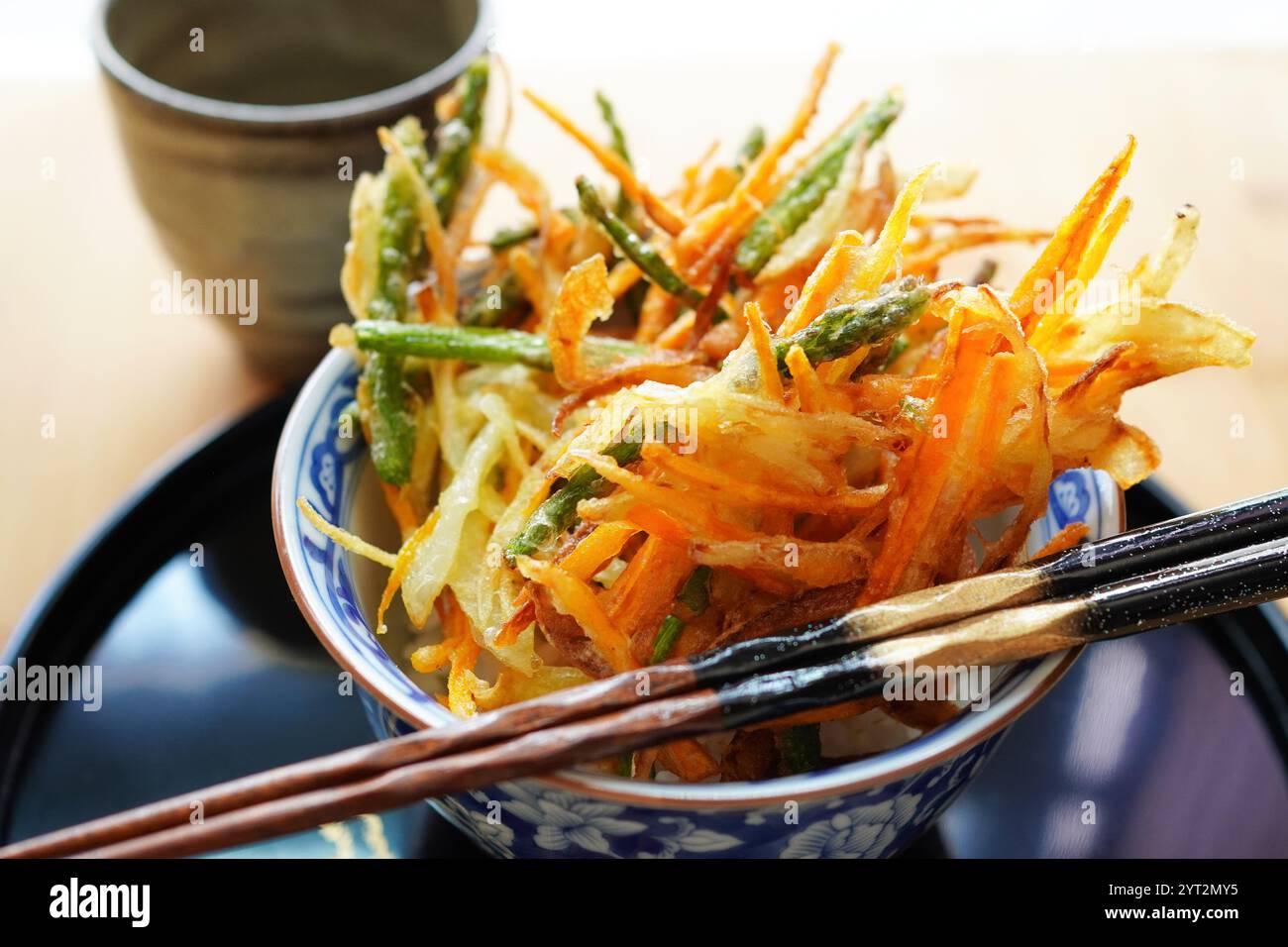 Kakiage tempura donburi, or crispy mixed vegetable tempura, is a hearty ...