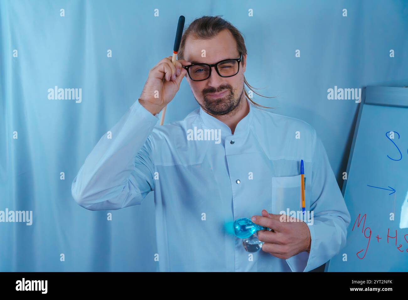 An eccentric scientist with a focused expression is surrounded by test ...