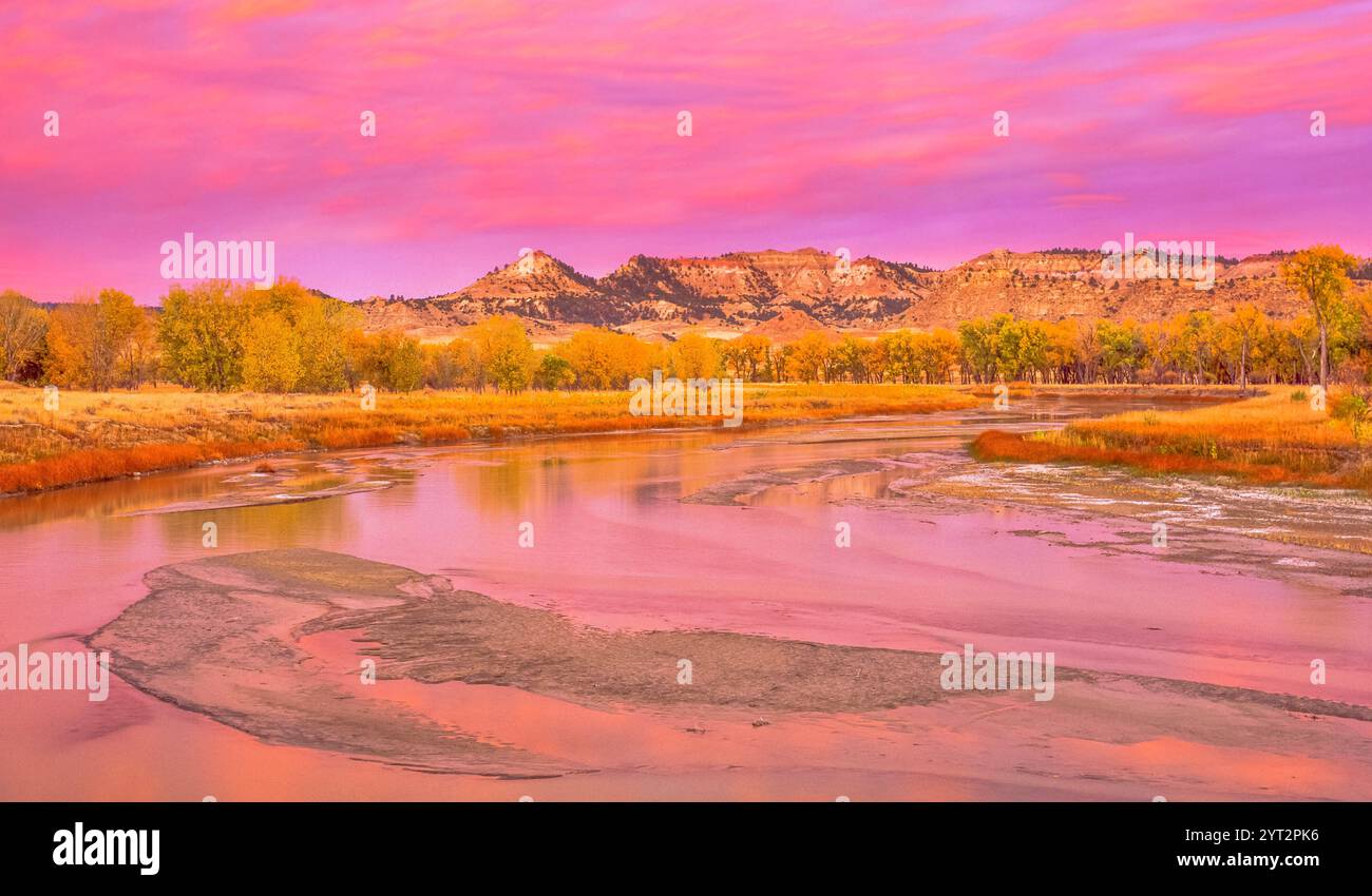 panorama of an autumn sunrise over the powder river and badlands near ...