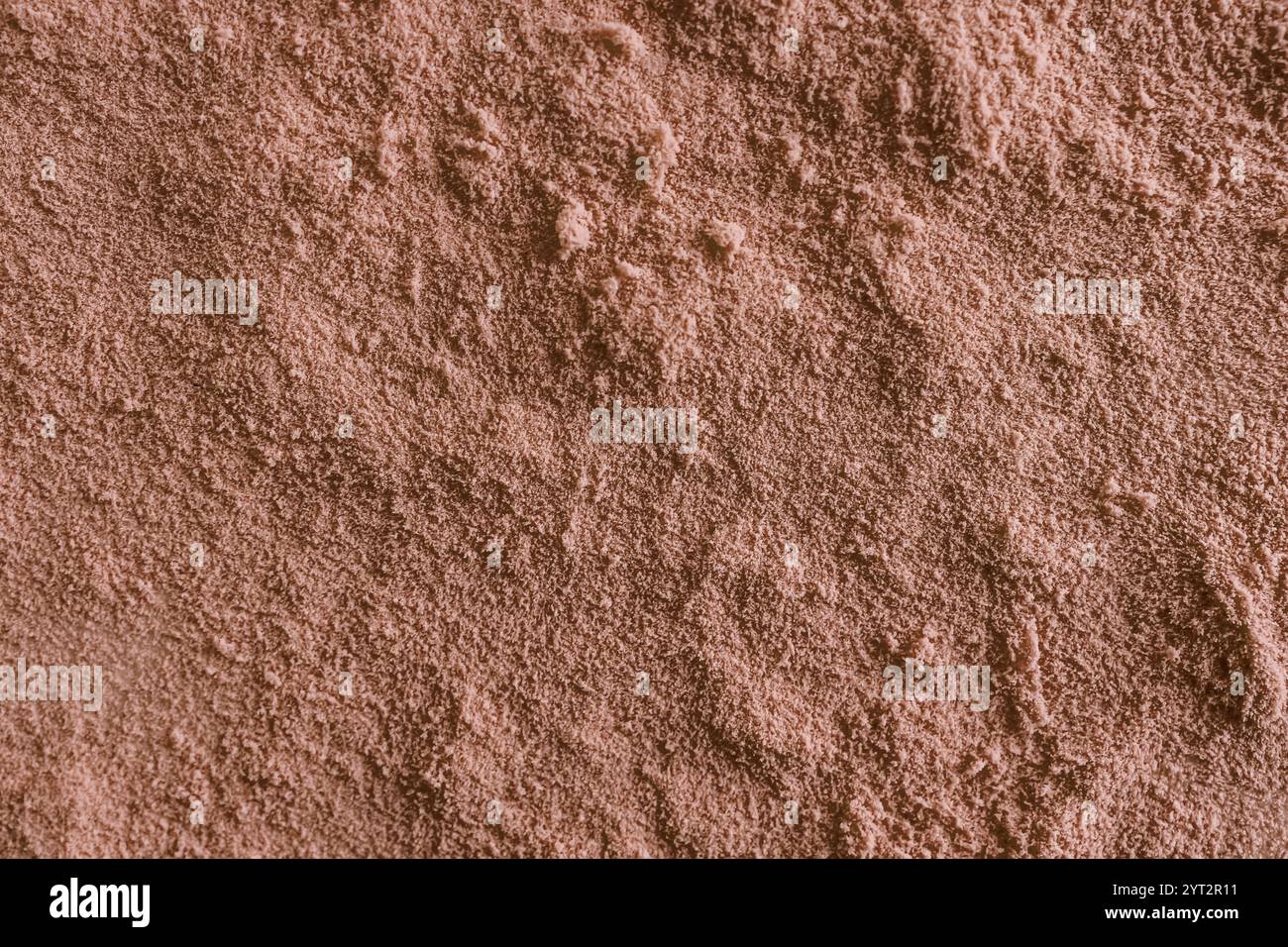 Cocoa powder surface close-up in color of the year 2025 mocha mousse ...