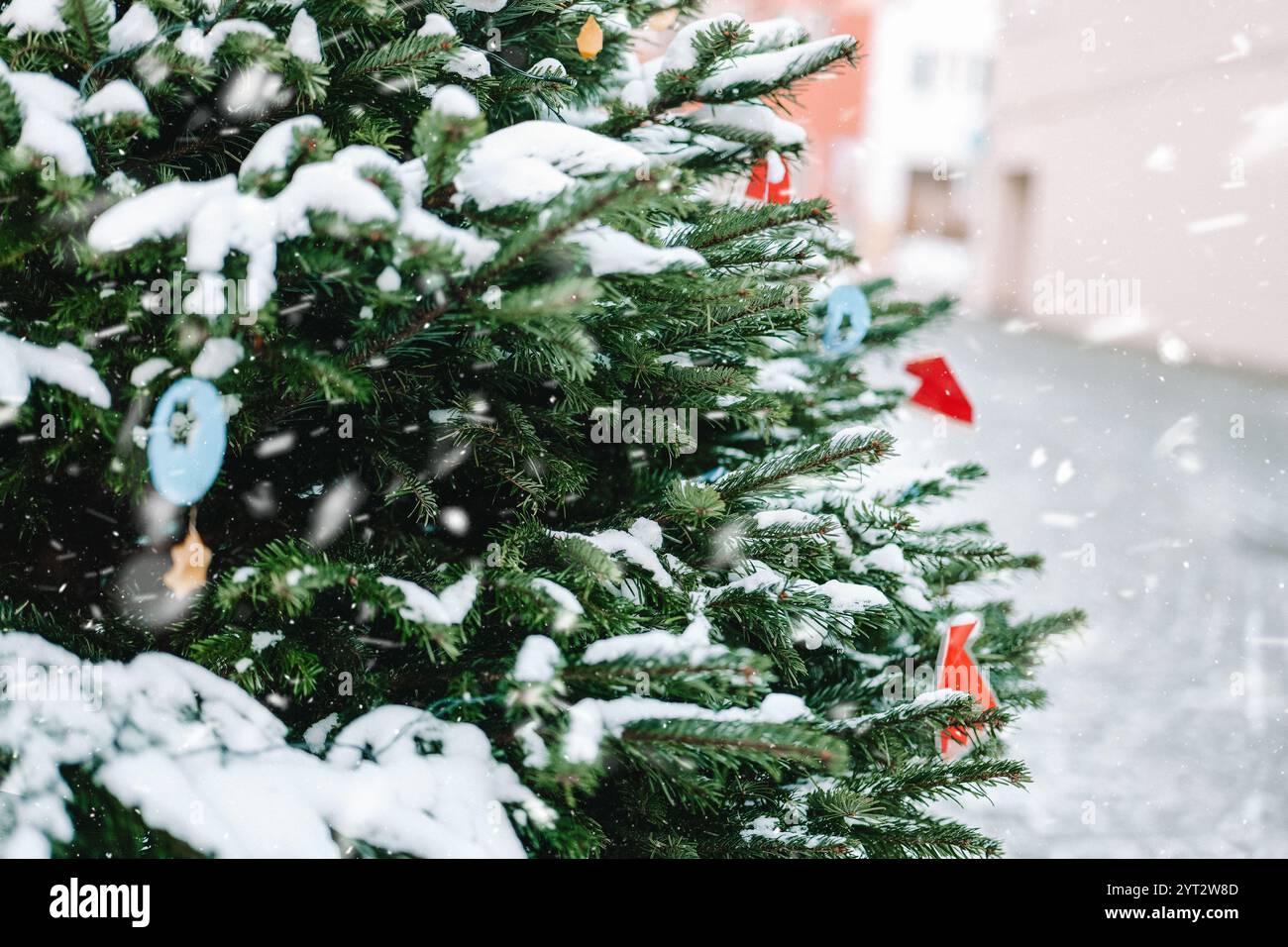Christmas tree and falling snow.Christmas street tree and falling snow ...