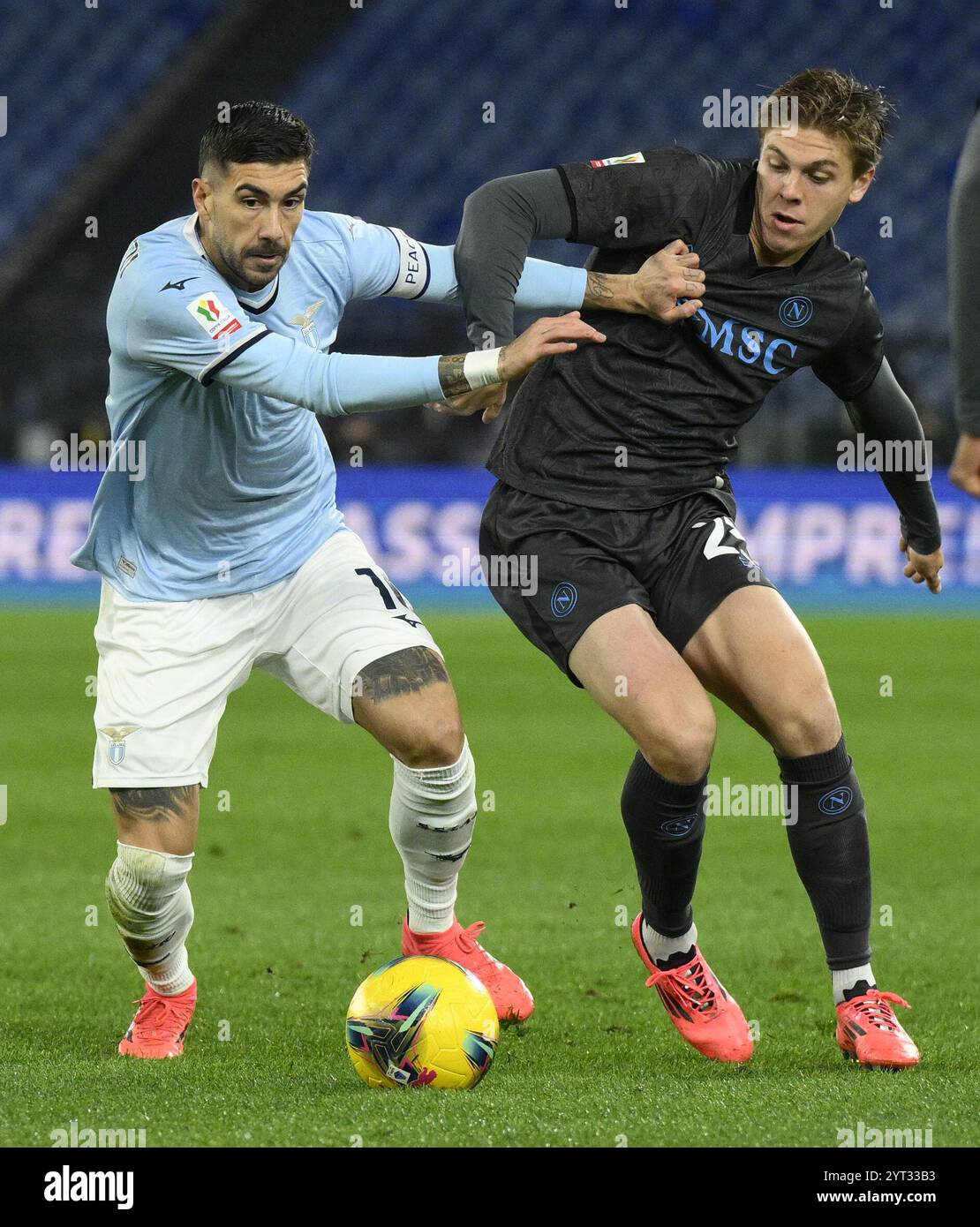 Rome, Italy. 5th Nov, 2024. Lazio's Mattia Zaccagni (L) vies with Napoli's Alessio Zerbin during ...