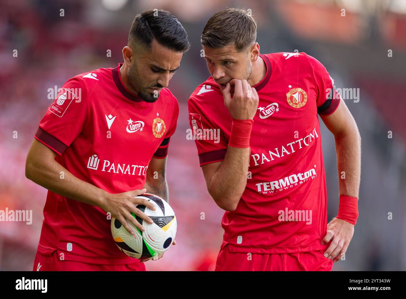Fran Alvarez (L) and Imad Rondic (R) of Widzew are seen in action ...
