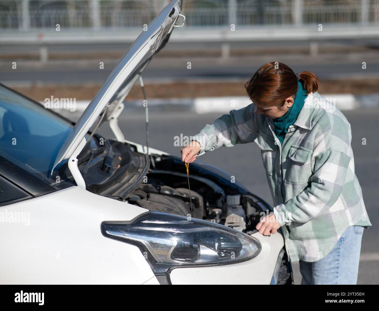 Woman car breakdown engine level hi-res stock photography and images ...