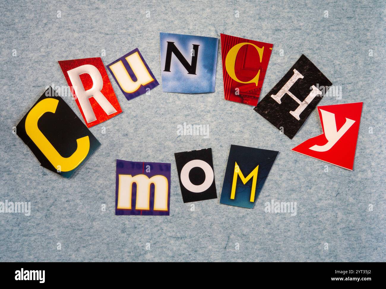 The concept "Crunchy Mom" spelled out in ransom note style typography ...