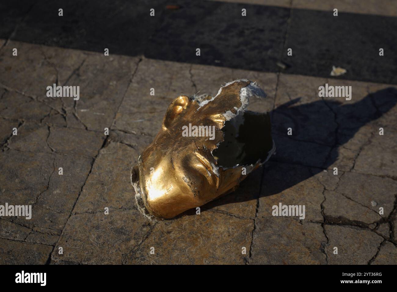 A broken bust of the old Syrian President Hafez Assad, father of the ...