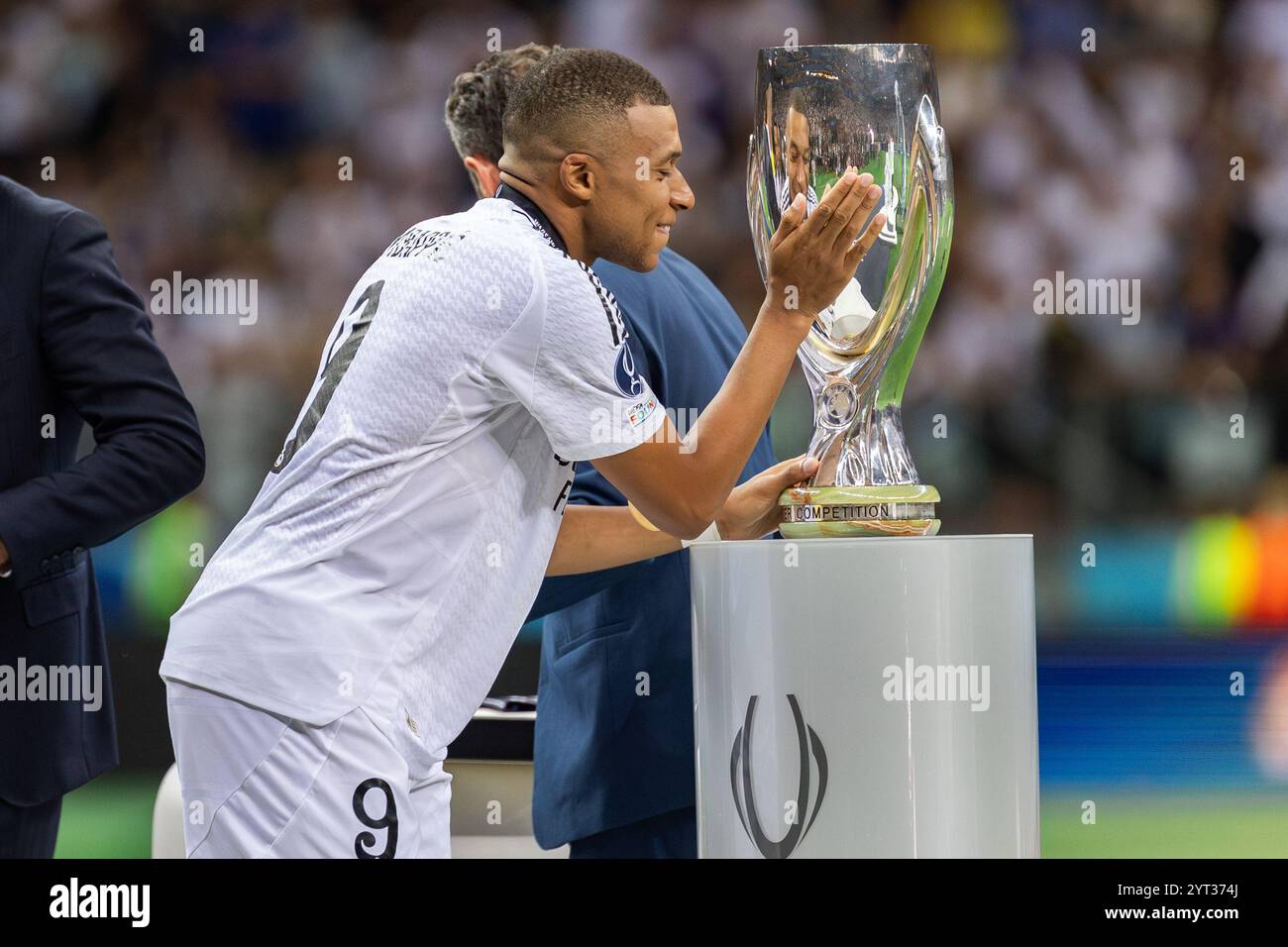 Kylian Mbappe of Real Madrid seen with trophy during the ceremony after the UEFA Super Cup 2024 ...