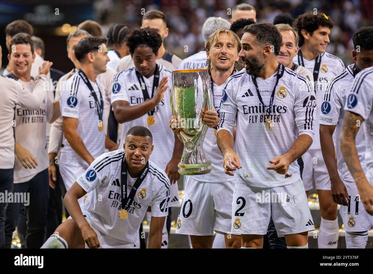 (L to R) Kylian Mbappe, Luka Modric and Dani Carvajal of Real Madrid celebrate victory during ...