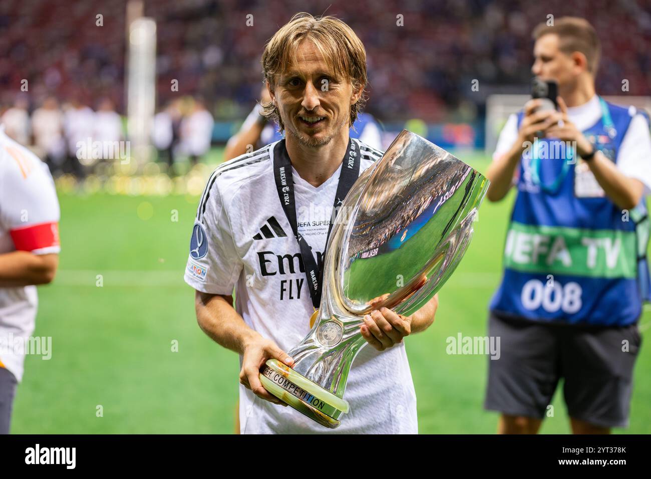 Luka Modric of Real Madrid poses for a photo with trophy during the ...