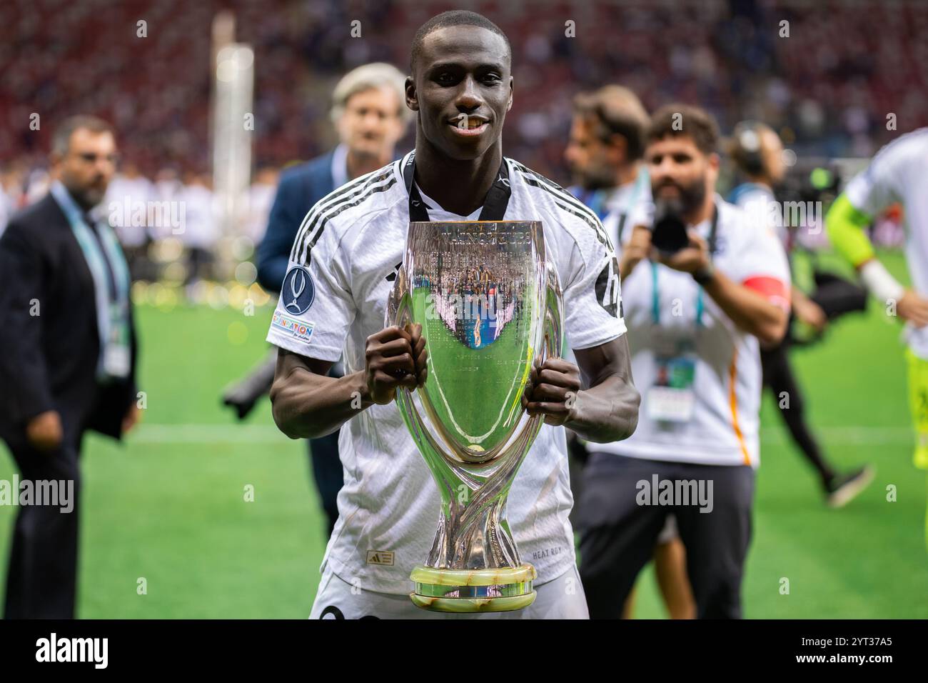 Ferland Mendy of Real Madrid poses for a photo with trophy during the ...