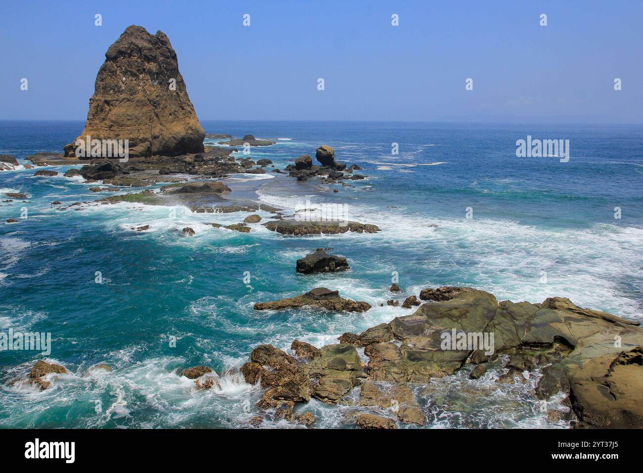 Shark teeth rock among the harsh south coast waves, Papuma Beach Stock ...