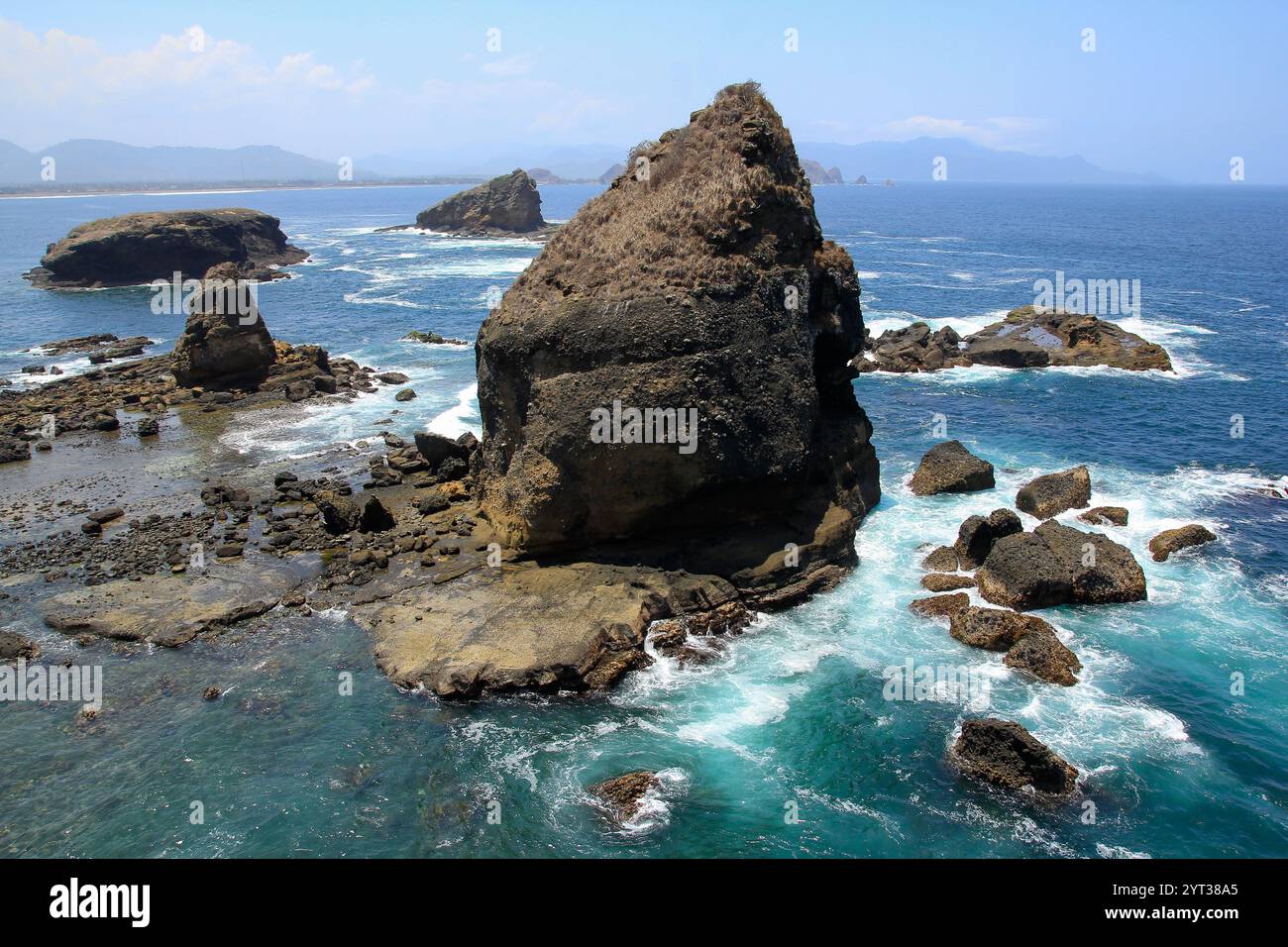 Large corals shaped like shark teeth adorn the coastline of Tanjung ...