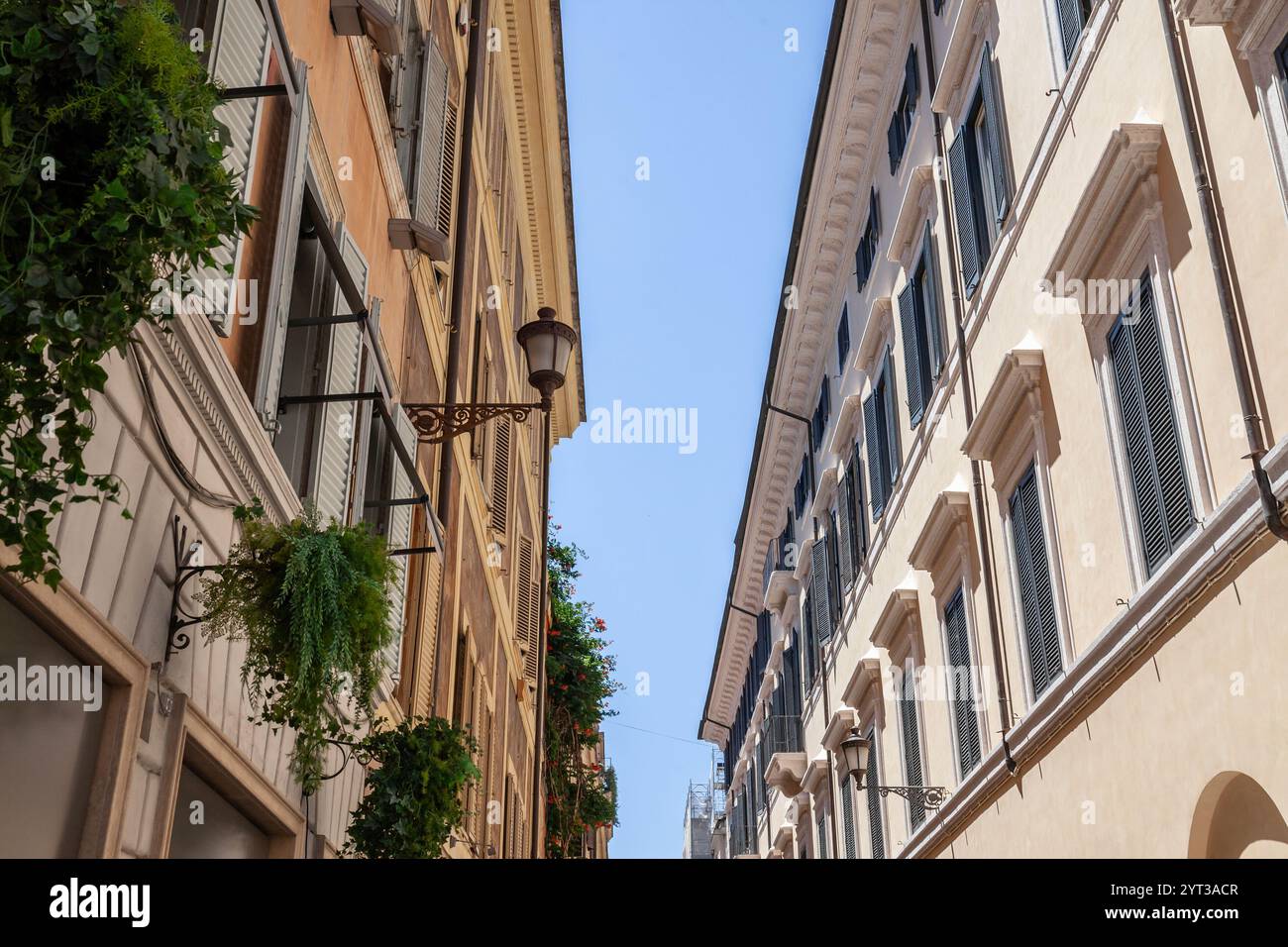 Facades of historic residential buildings in old Rome, showcasing Roman ...