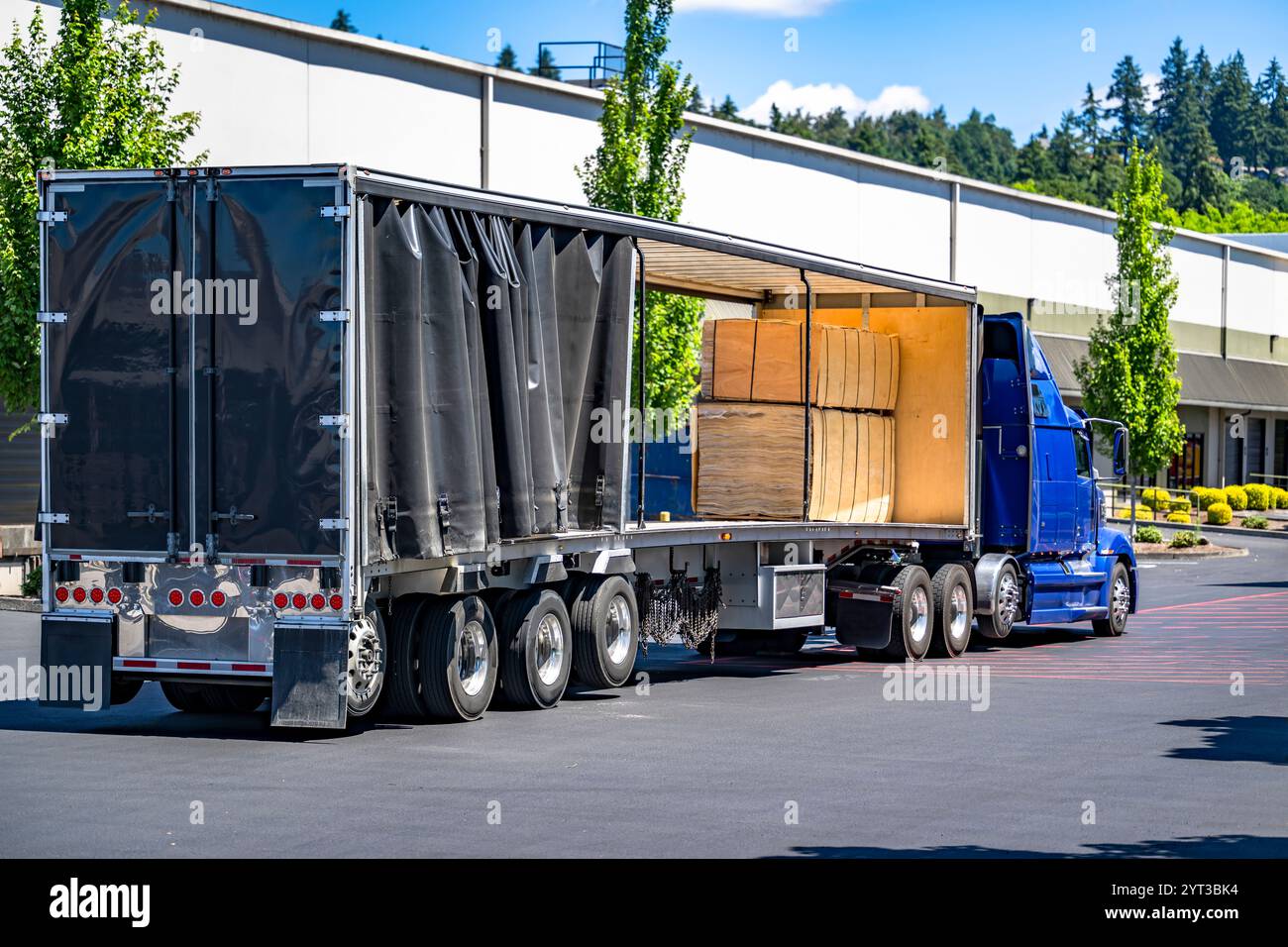 Industrial grade blue big rig classic semi truck with extended cab for ...