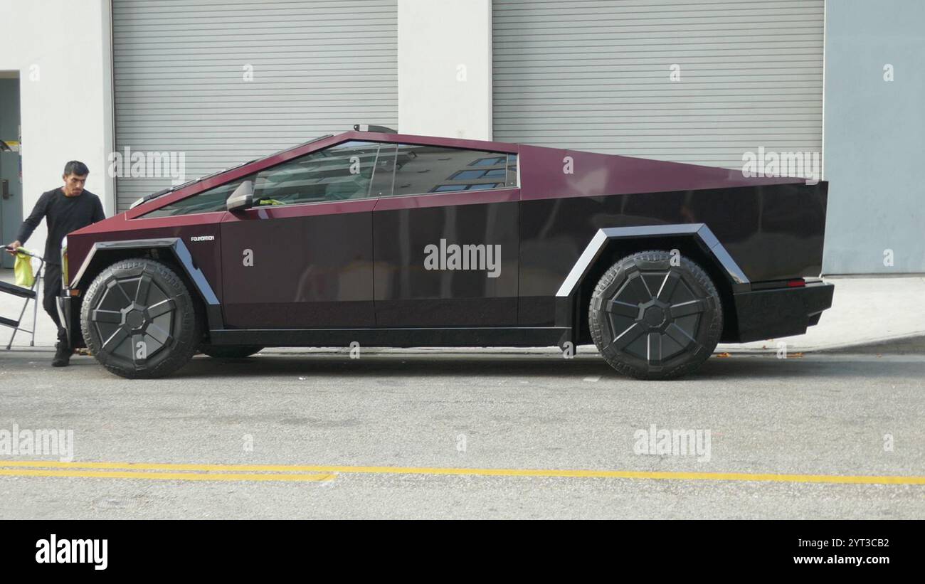 Los Angeles, California, USA 5th December 2024 Burgundy Maroon Tesla ...