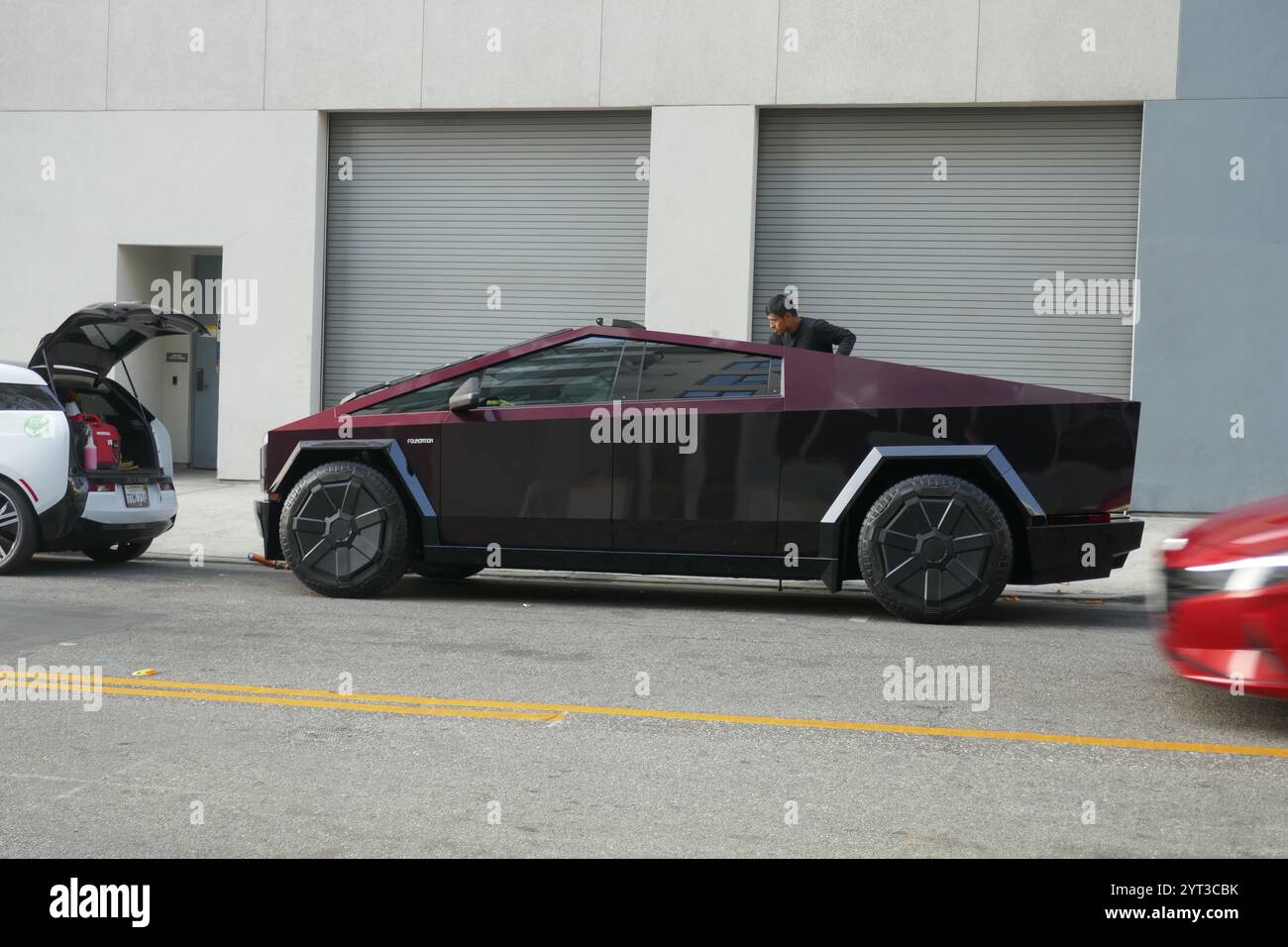 Los Angeles, California, USA 5th December 2024 Burgundy Maroon Tesla ...