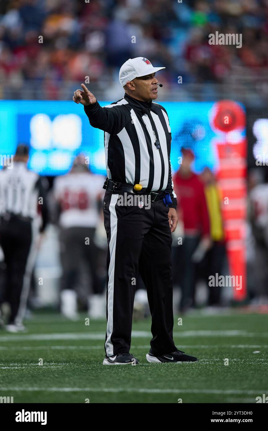 Referee Tra Blake (3) makes a penalty call during an NFL Football game ...