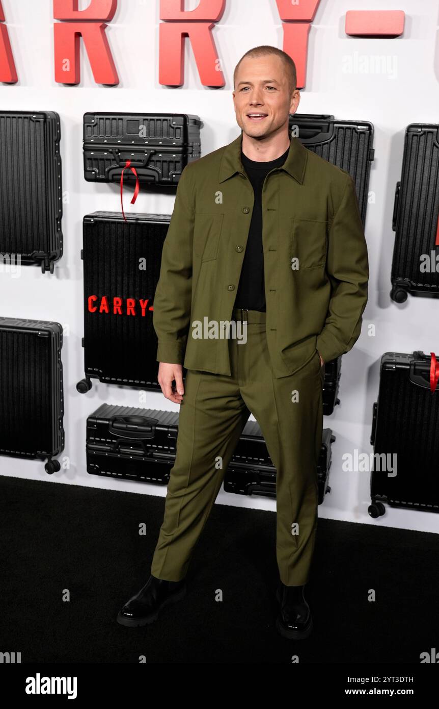 Taron Egerton, a cast member in "Carry-On," poses at the premiere of ...