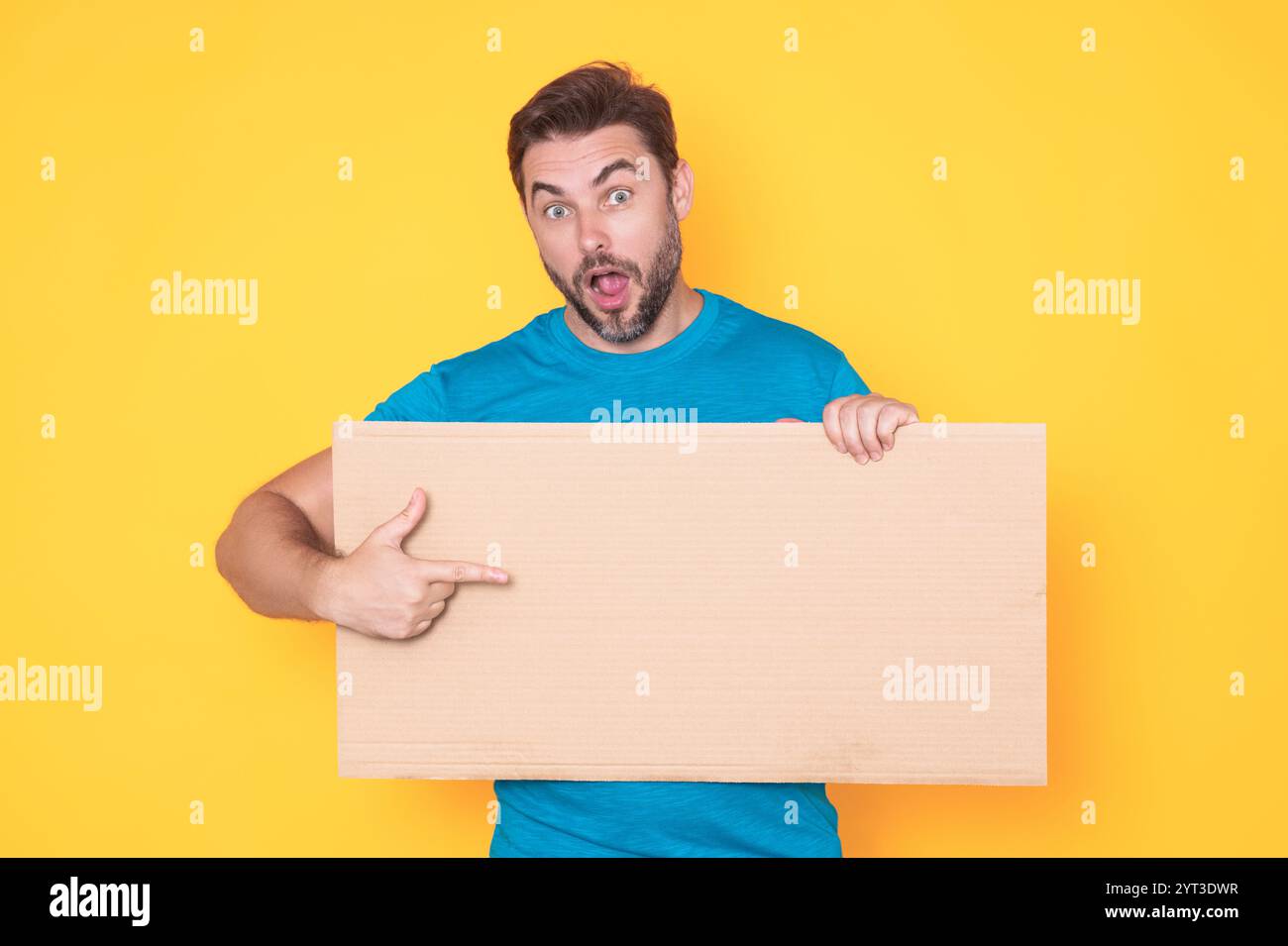 Man holds sign, blank card. Placard ready for your product. Man showing ...