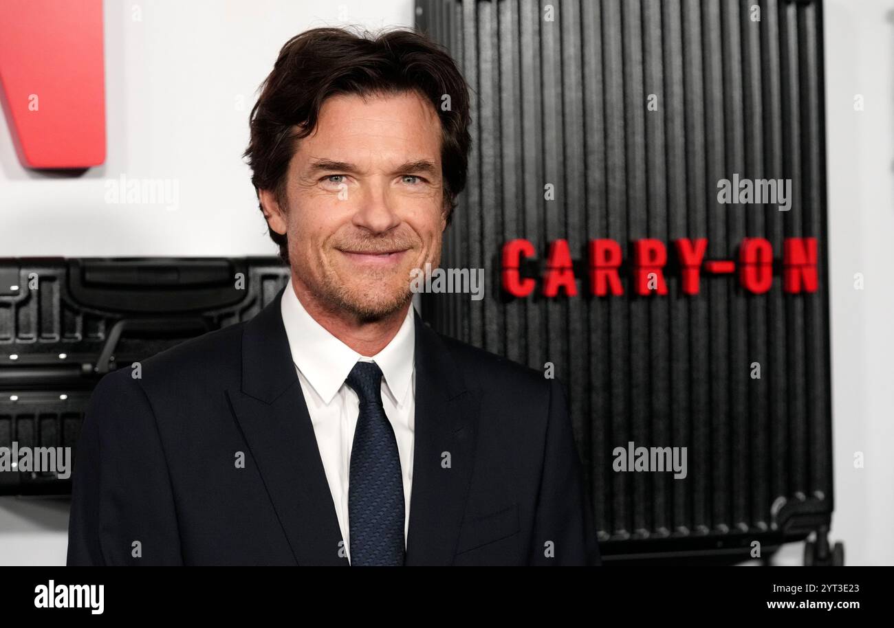 Jason Bateman, a cast member in "Carry-On," poses at the premiere of ...