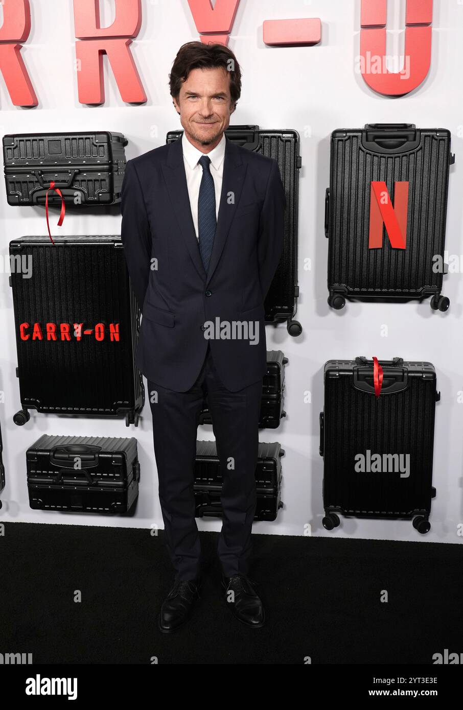 Jason Bateman, a cast member in "Carry-On," poses at the premiere of ...