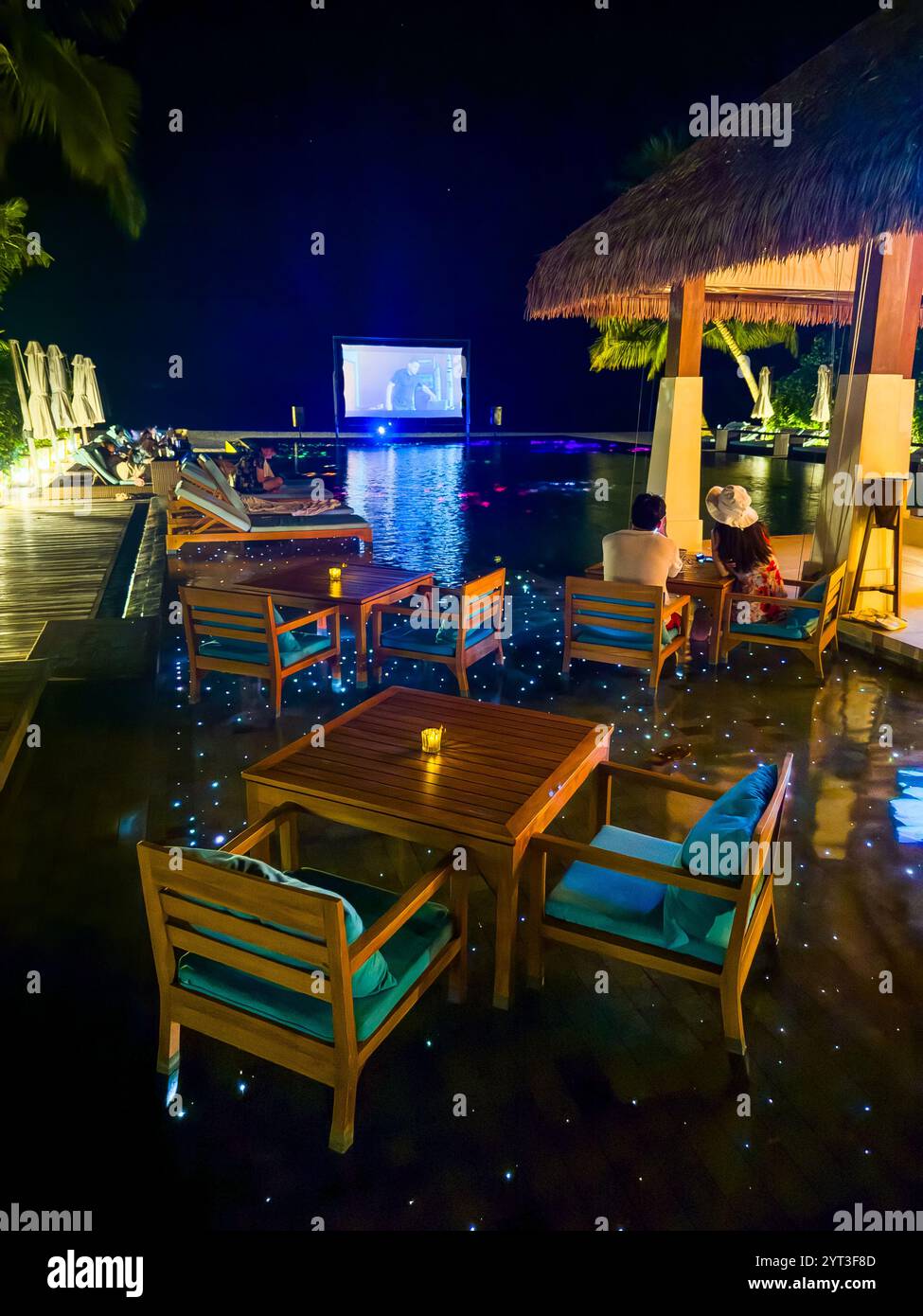 Pool bar at night in the Maldives, Asia Stock Photo - Alamy