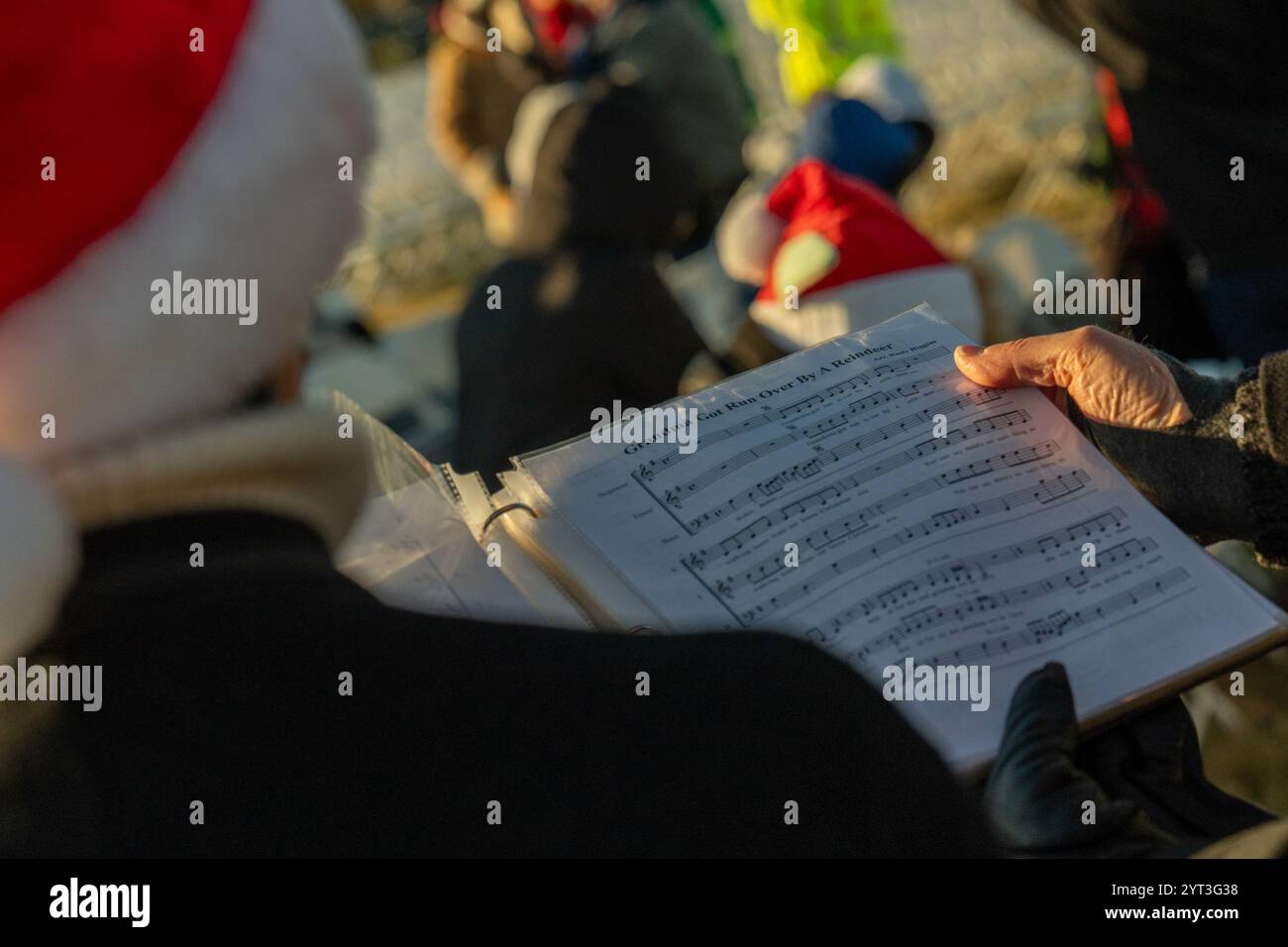 Washington, United States. 05th Dec, 2024. Carolers sing ahead of the ...