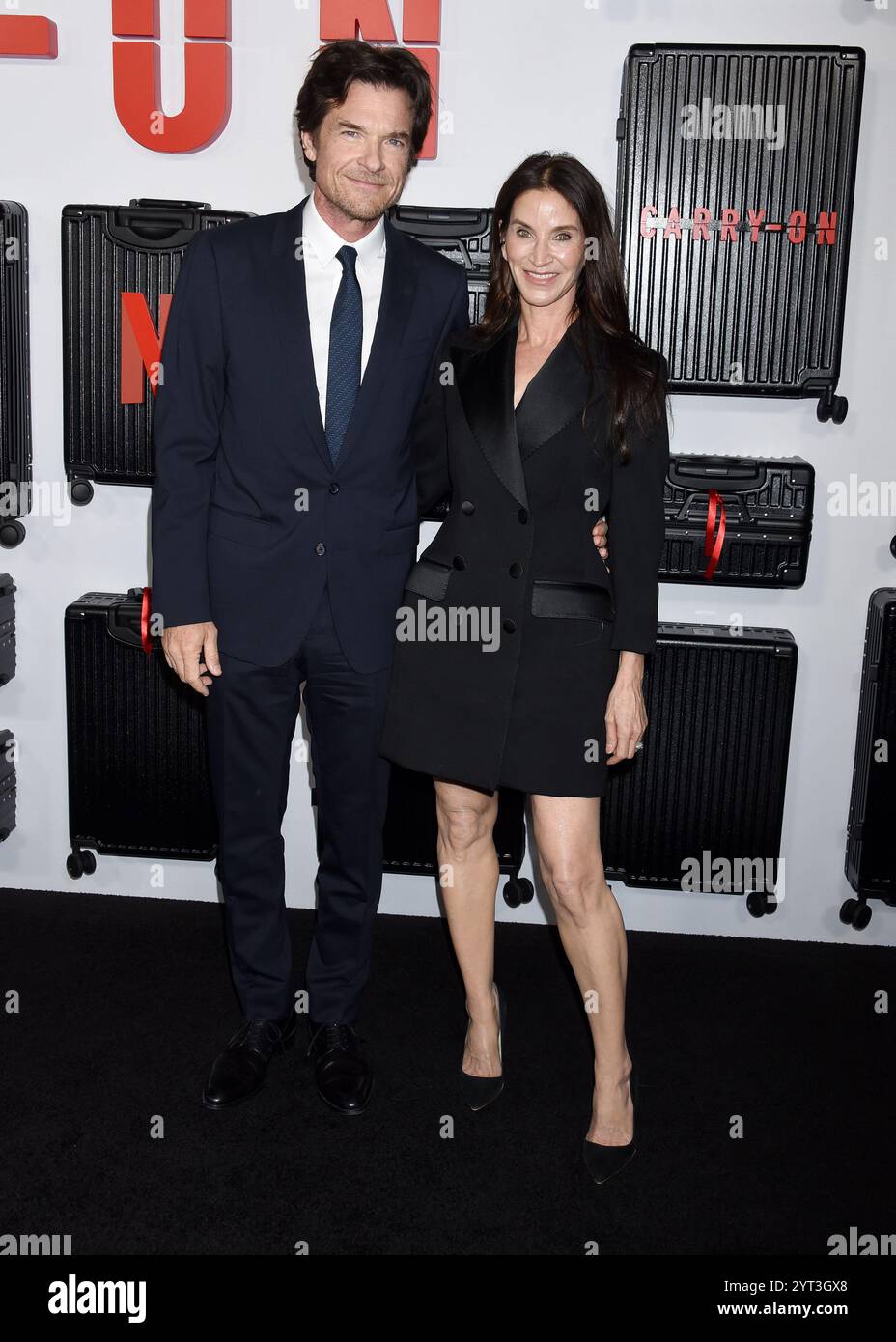 Hollywood, USA. 05th Dec, 2024. Jason Bateman and Amanda Anka arriving ...