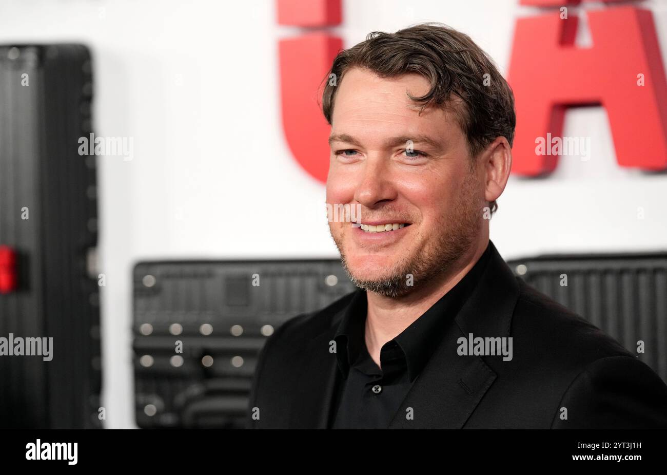 Joe Williamson poses at the premiere of the film "Carry-On" on Thursday ...