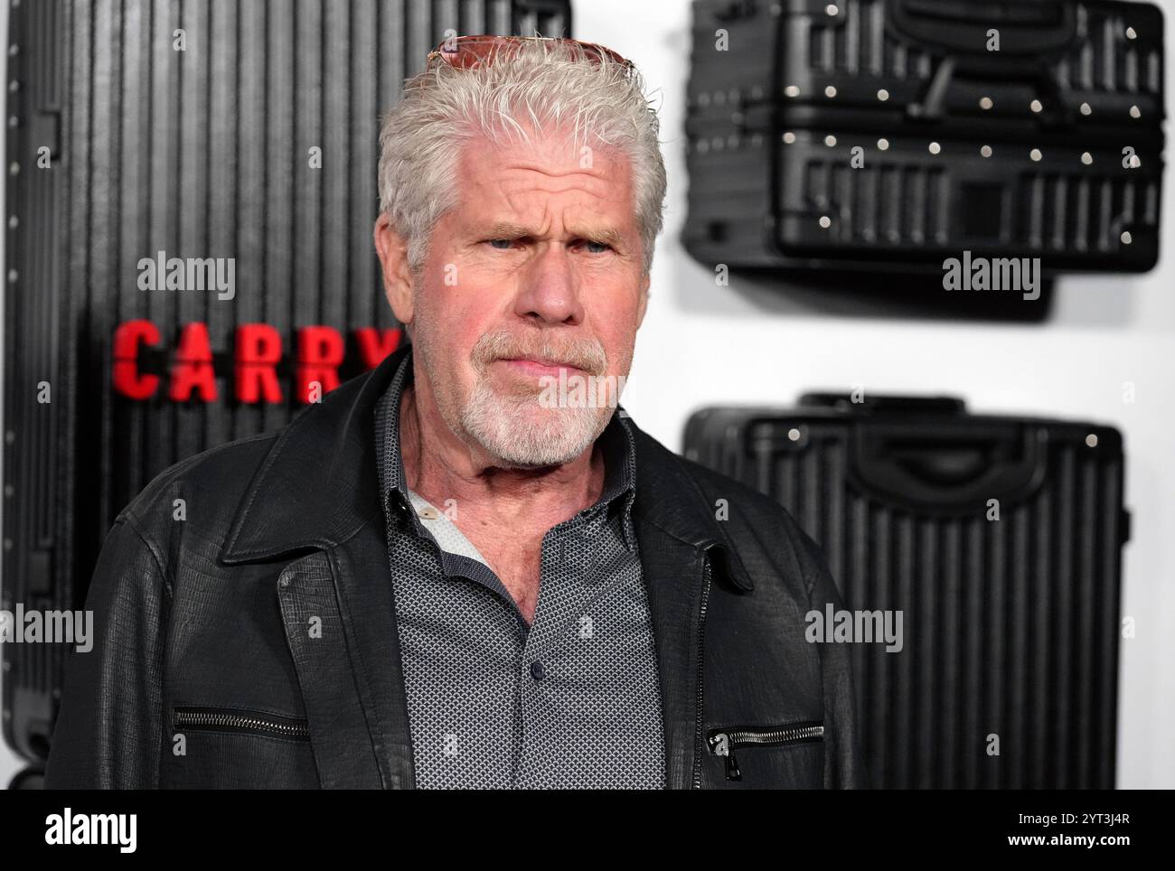 Ron Perlman poses at the premiere of the film "Carry-On" on Thursday ...