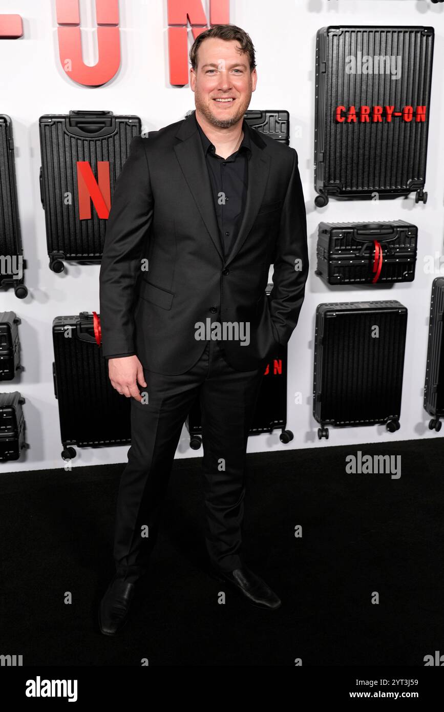 Joe Williamson poses at the premiere of the film "Carry-On" on Thursday ...