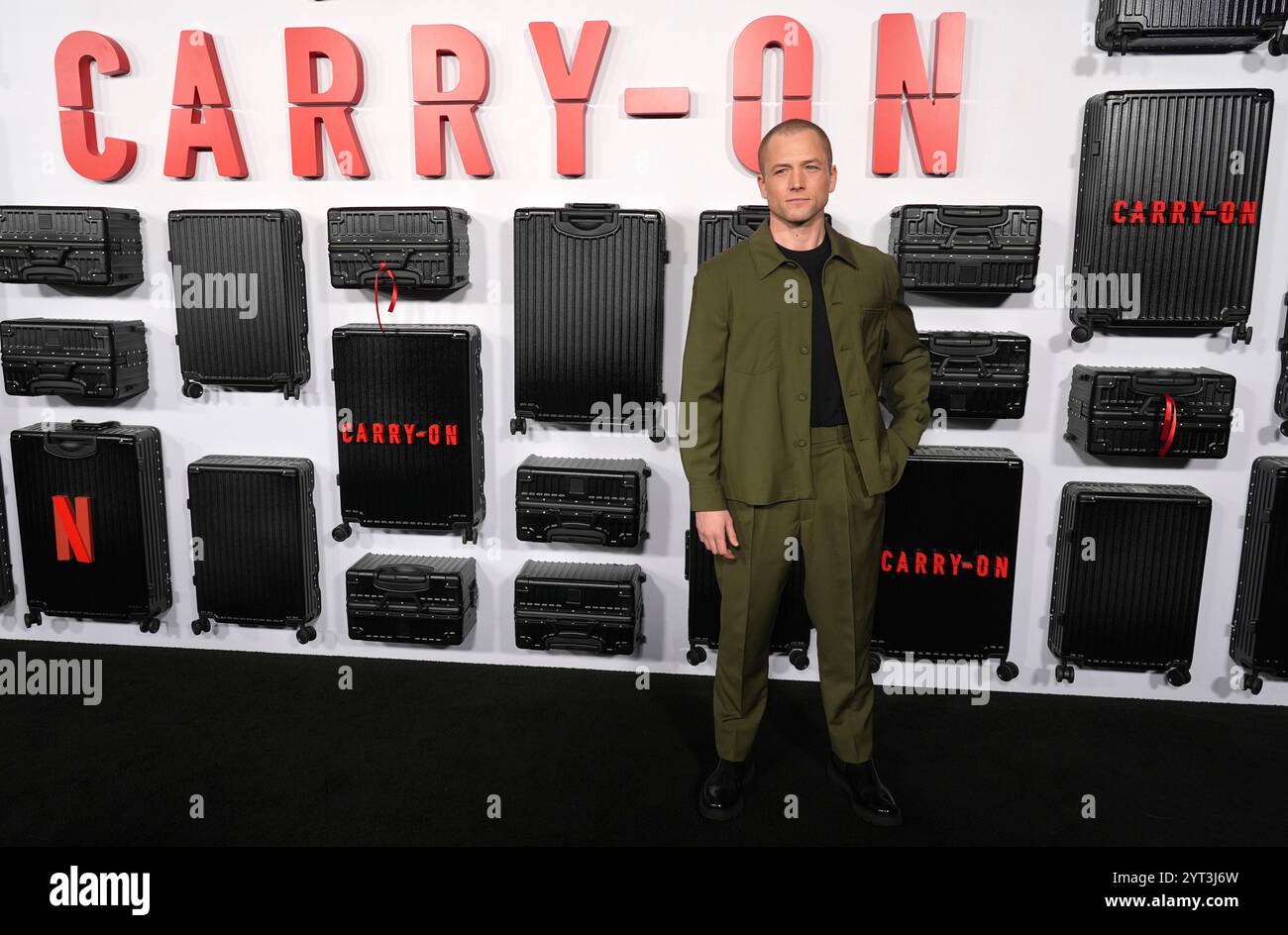 Taron Egerton poses at the premiere of the film "Carry-On" on Thursday ...