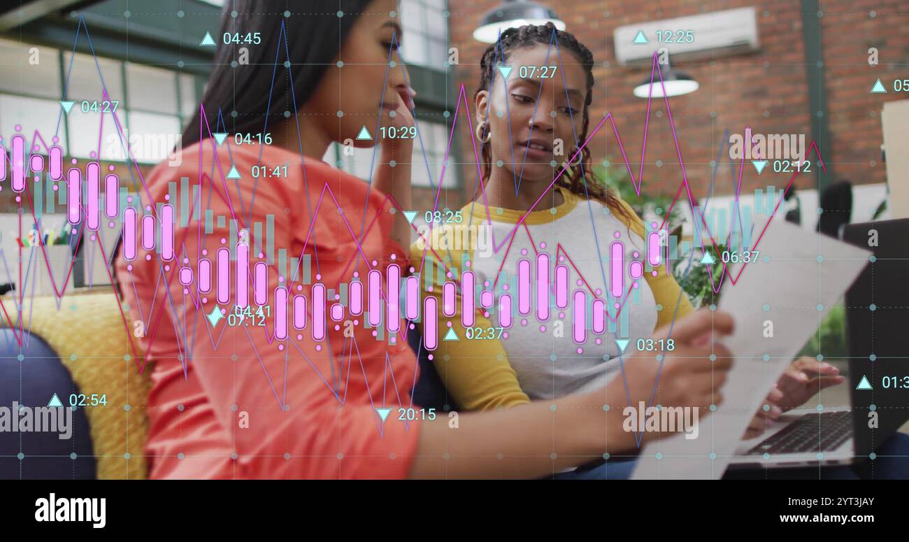 Image of diagrams and data processing over diverse female colleagues ...