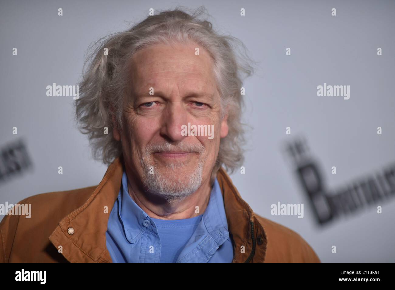 Clancy Brown arrives at the premiere of "The Brutalist" on Thursday ...