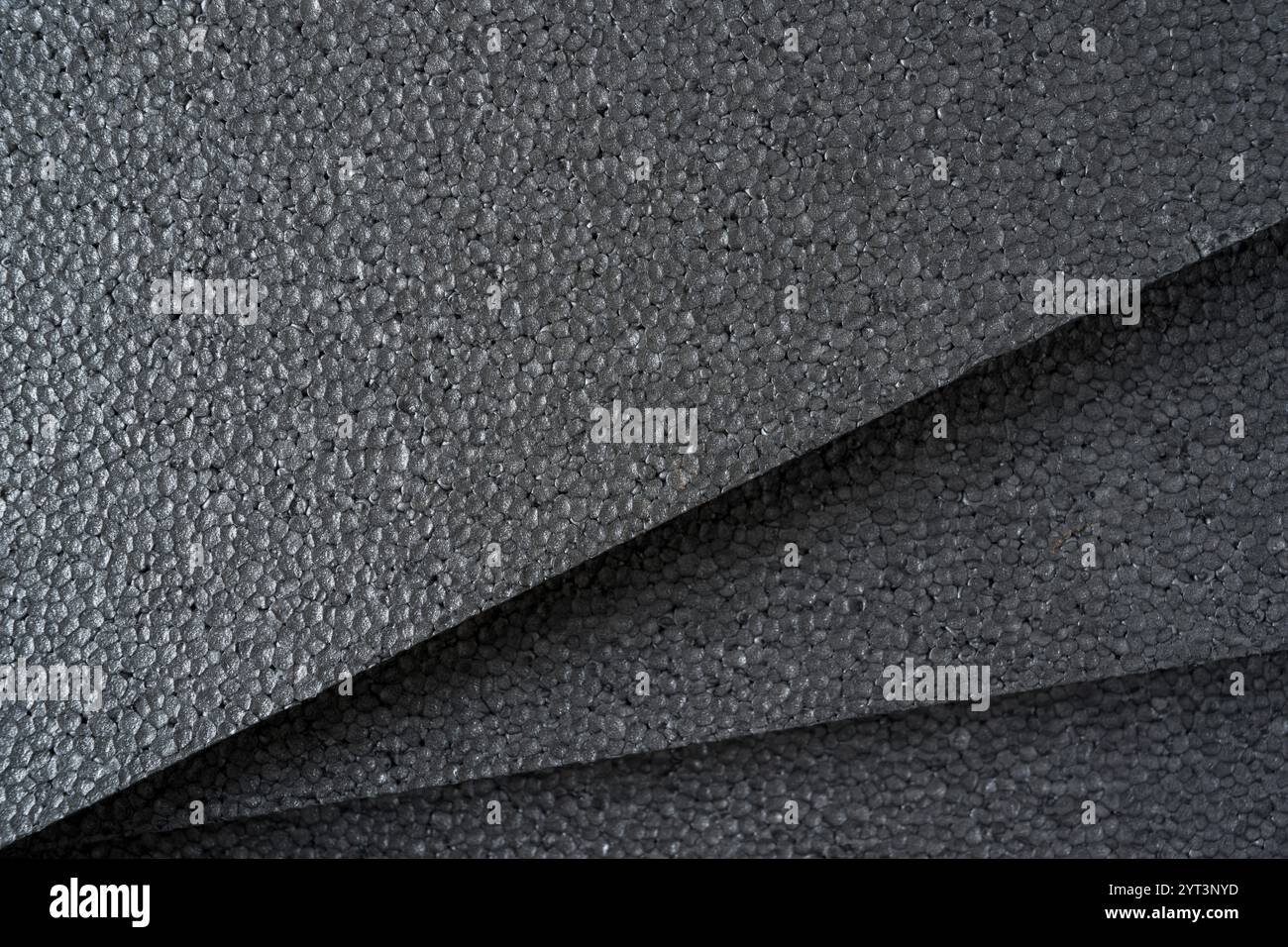 Top view of grey thermal insulation styrofoam sheets stacked on top of ...